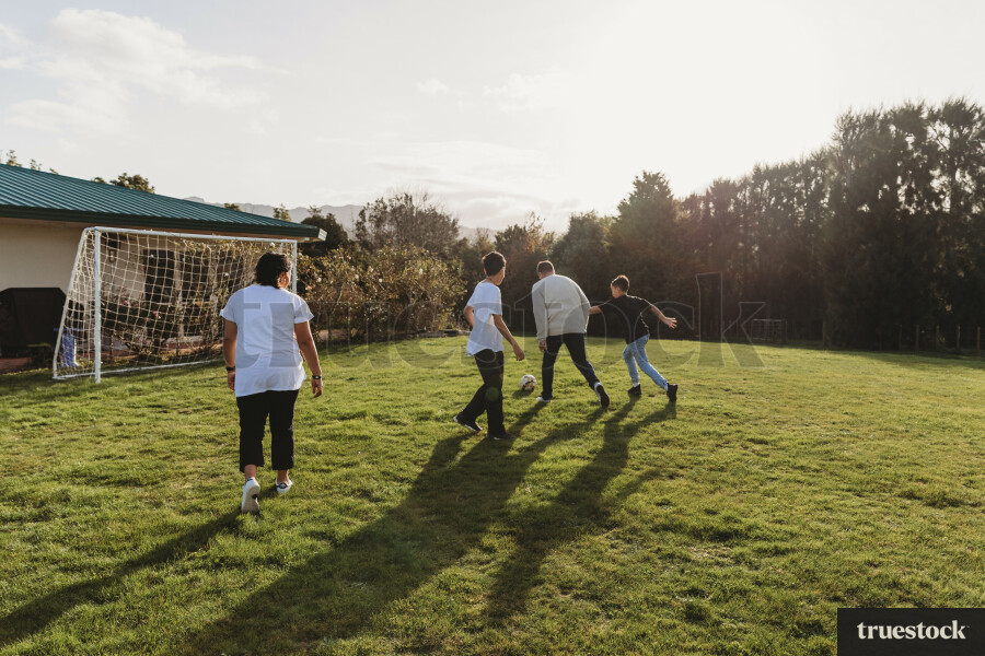 Family Playing Football