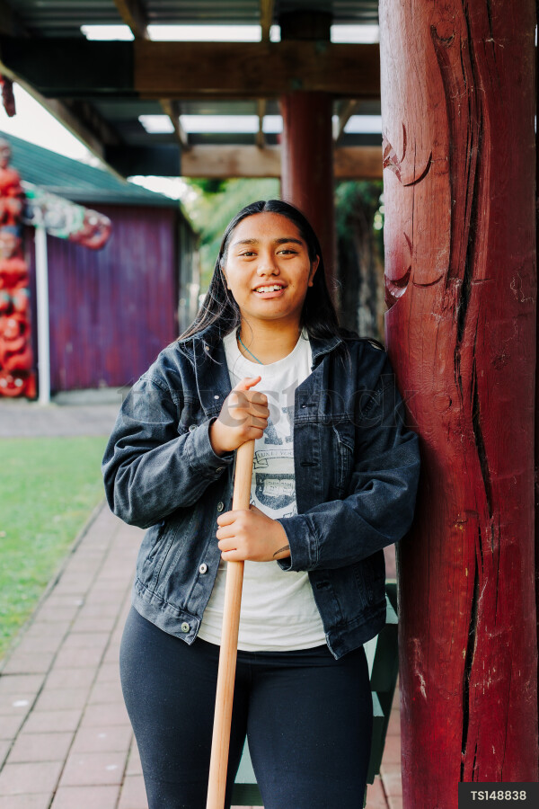 Portrait of Teen Girl at Marae by Erica Sinclair - Truestock
