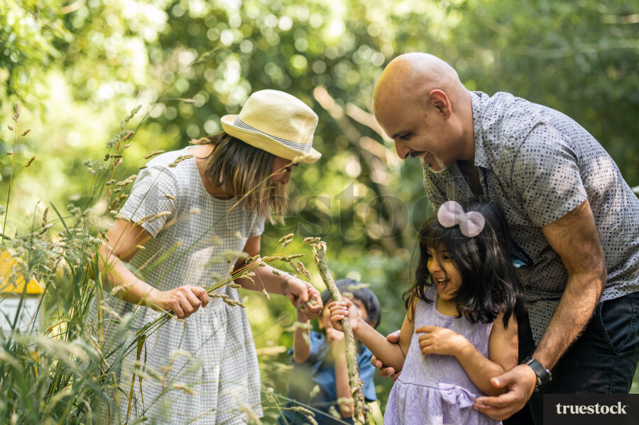 Family Walking Along a Nature Trail by James Stonley - Truestock