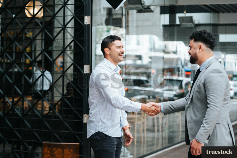 Business Men Greeting Each Other by Ngahuia Ormsby - Truestock
