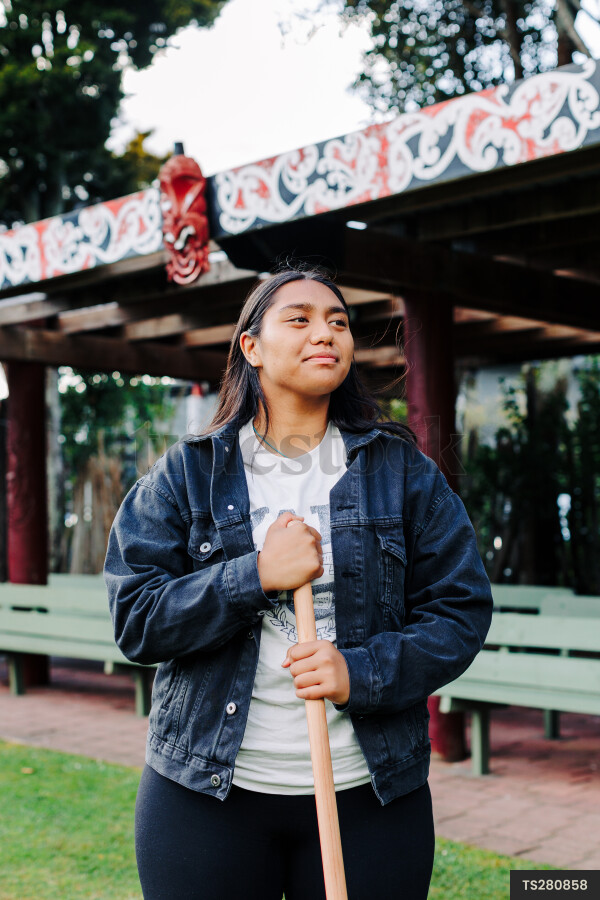 Portrait of Teen Girl at Marae by Erica Sinclair - Truestock