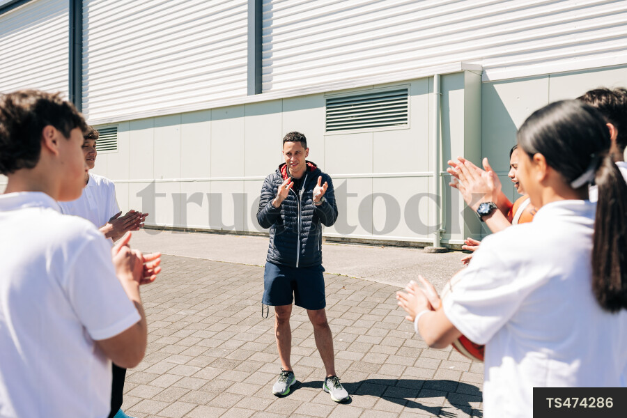 Students Having P.E Class on Court by Erica Sinclair - Truestock