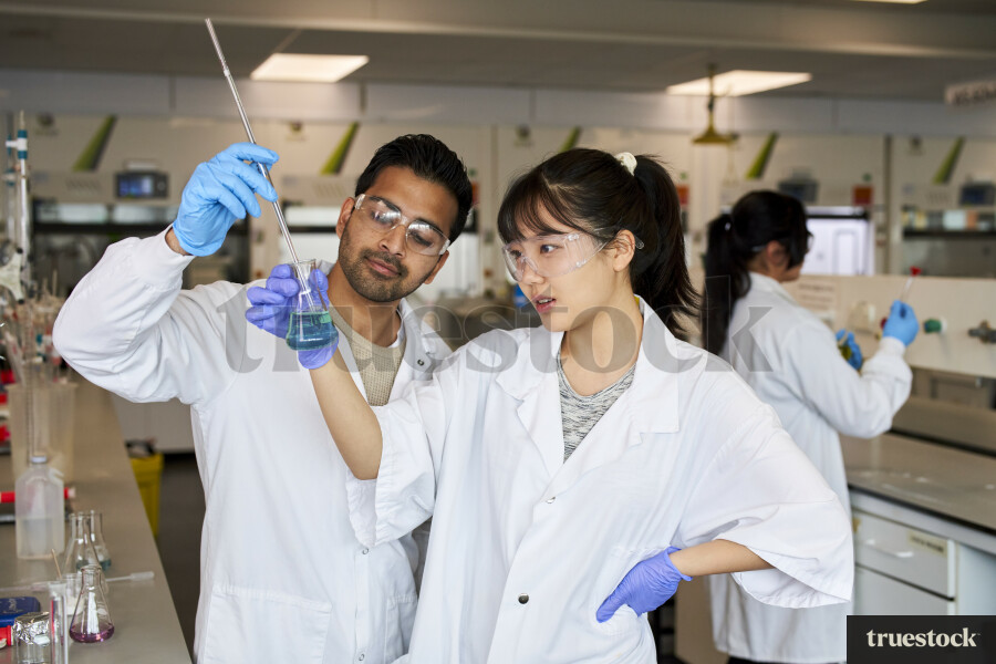 TS487326 Students Doing Tests in Lab by Spid Pye - Truestock