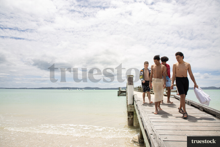 Friends Walking of Wharf by Emma Diack - Truestock