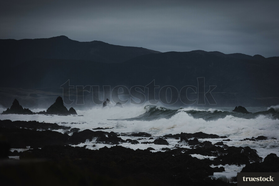 Storm causing rising tide levels in the ocean by Danny Rood - Truestock