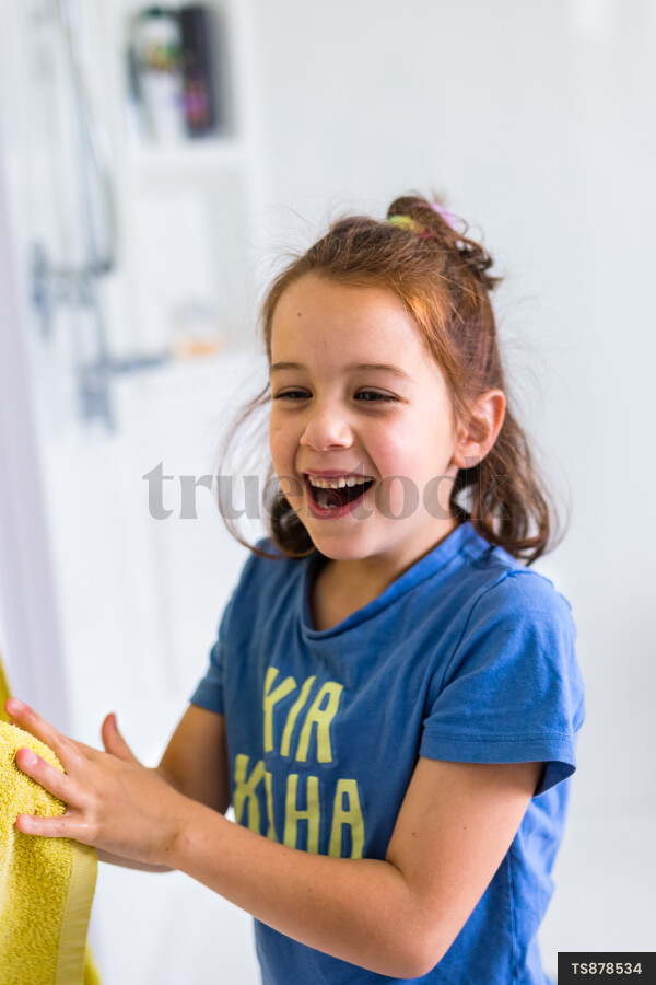 Young Girl Drying Hands by Northland Photography - Laura Evans - Truestock
