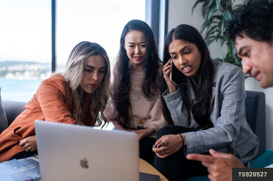 Colleagues Have Meeting at Work by James Stonley - Truestock